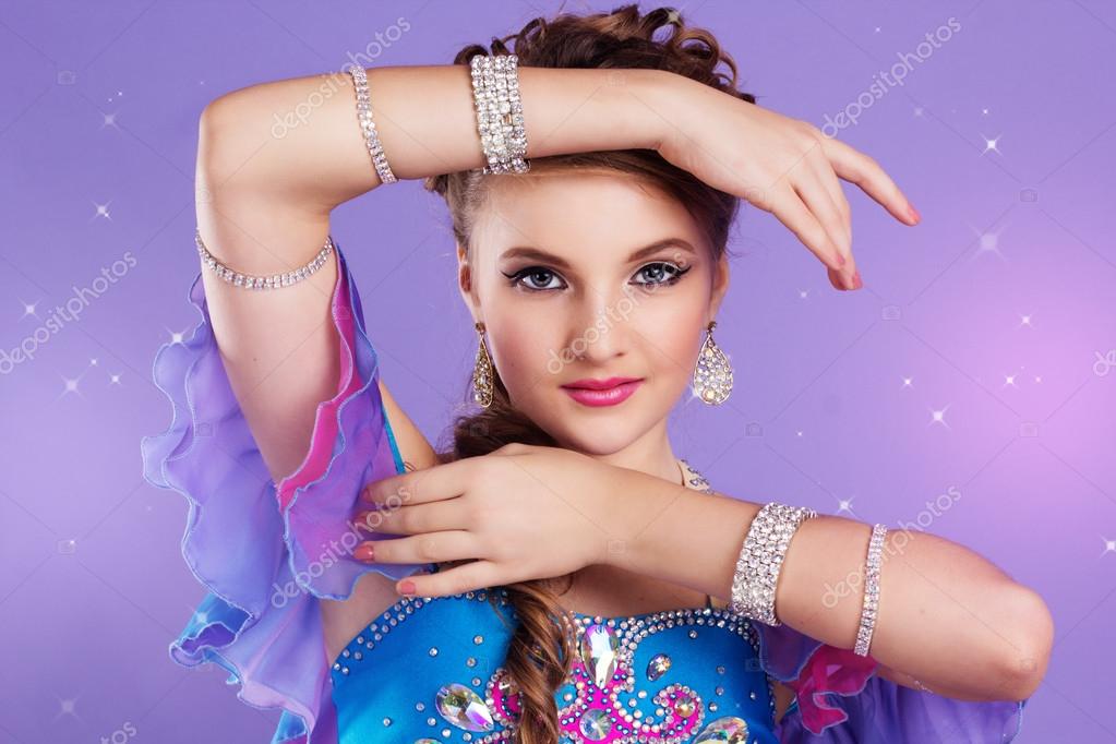 Beautiful Belly Dancer Wearing A Purple Costume Stock Photo By ...