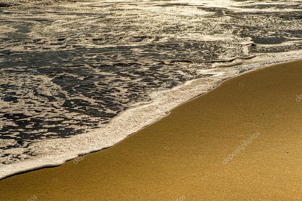 Tidal Wave on Sandy Shore Stock Photo by ©woodkern 58157913