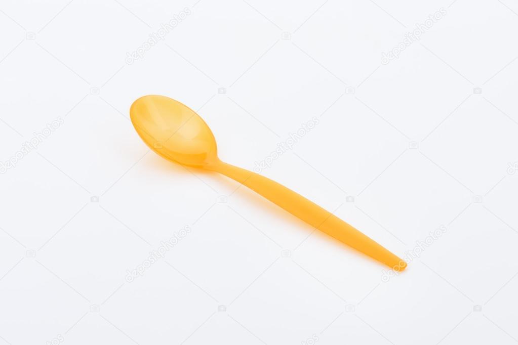 Orange plastic spoon Stock Photo by ©ajafoto 81199892