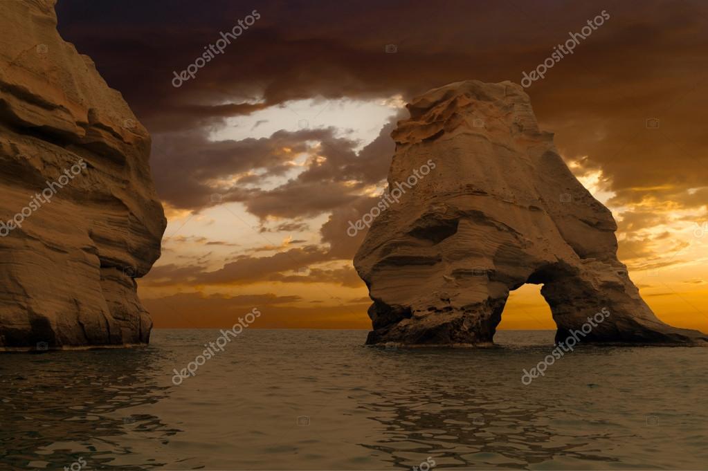 Caves and rock formations by the sea at Sarakiniko area on Milos Stock ...