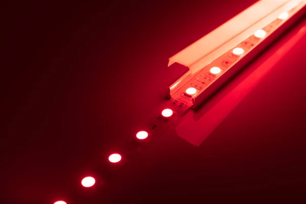 led strip red light in aluminum channel diffuser - Stock Image - Everypixel