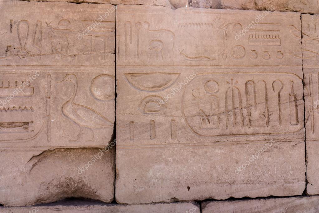 Egyptian hieroglyphics on the stone wall. — Stock Photo © ewastudio ...