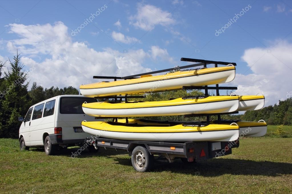 Tourist kayaks transportation – Stock Editorial Photo © vilaxlt #90577388