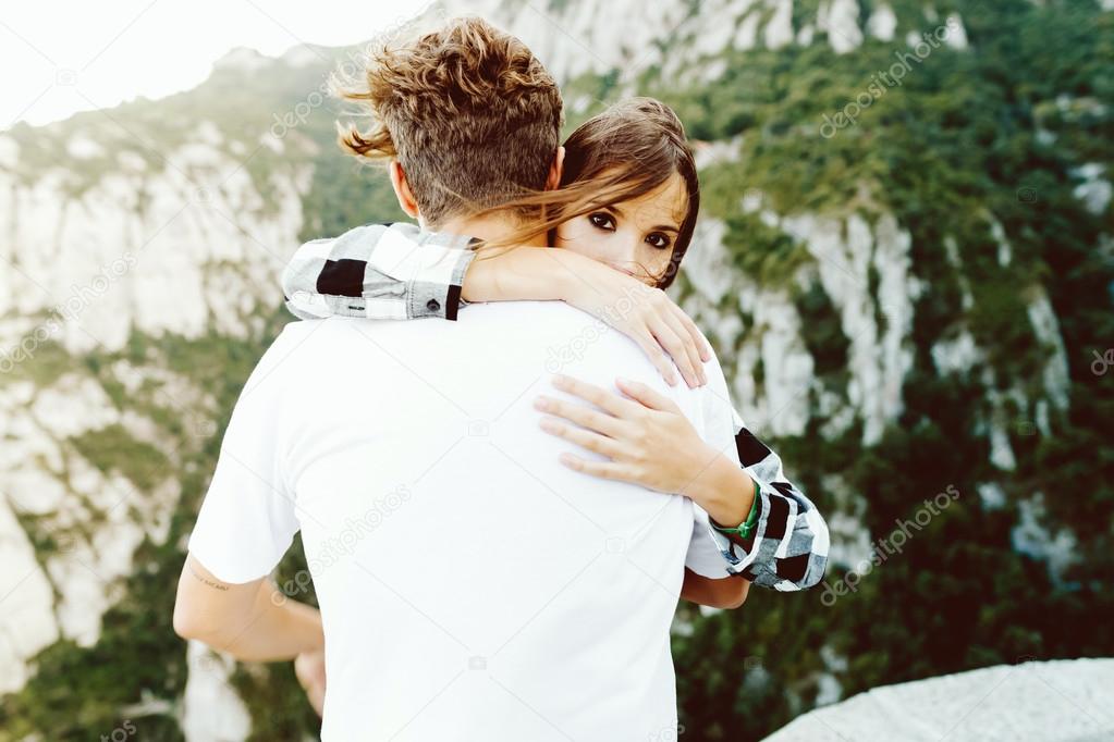 Beautiful young couple enjoying nature on mountain. Stock Photo by ©nenetus 122786852