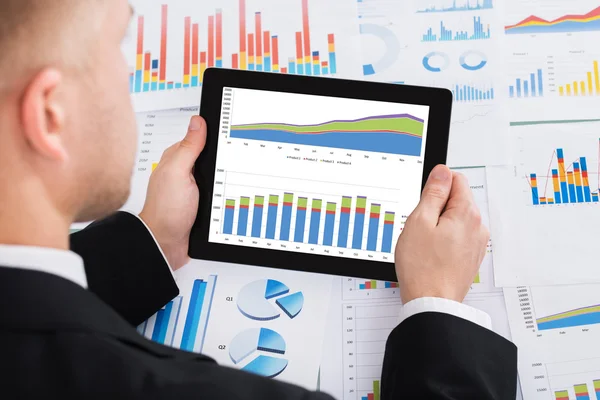 Businessperson Analyzing Graph - Stock Image - Everypixel