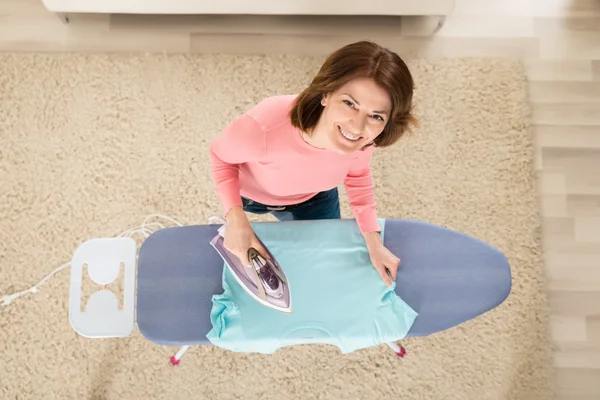Woman Ironing Clothes - Stock Image - Everypixel
