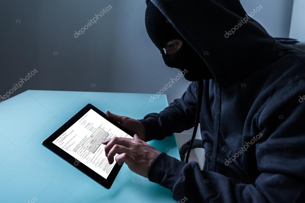 Hacker Stealing Information — Stock Photo © AndreyPopov #104088706