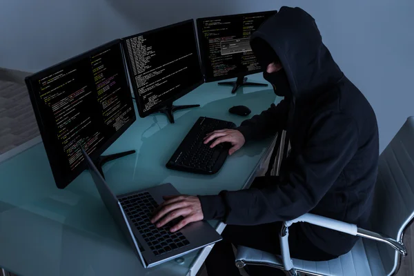 Hacker breaks into network Stock Photos, Royalty Free Hacker breaks ...