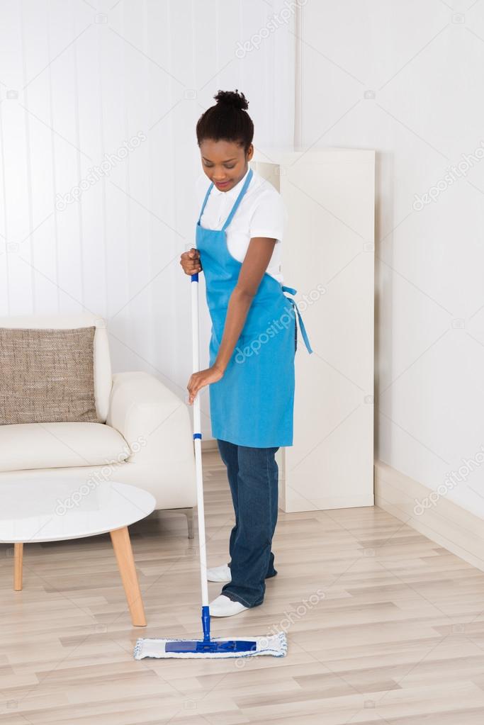 Maid Mopping Floor