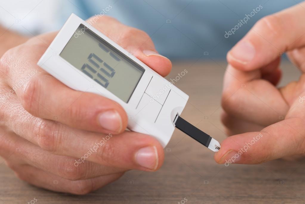 Patient Measuring Glucose Level Stock Photo by ©AndreyPopov 108388098