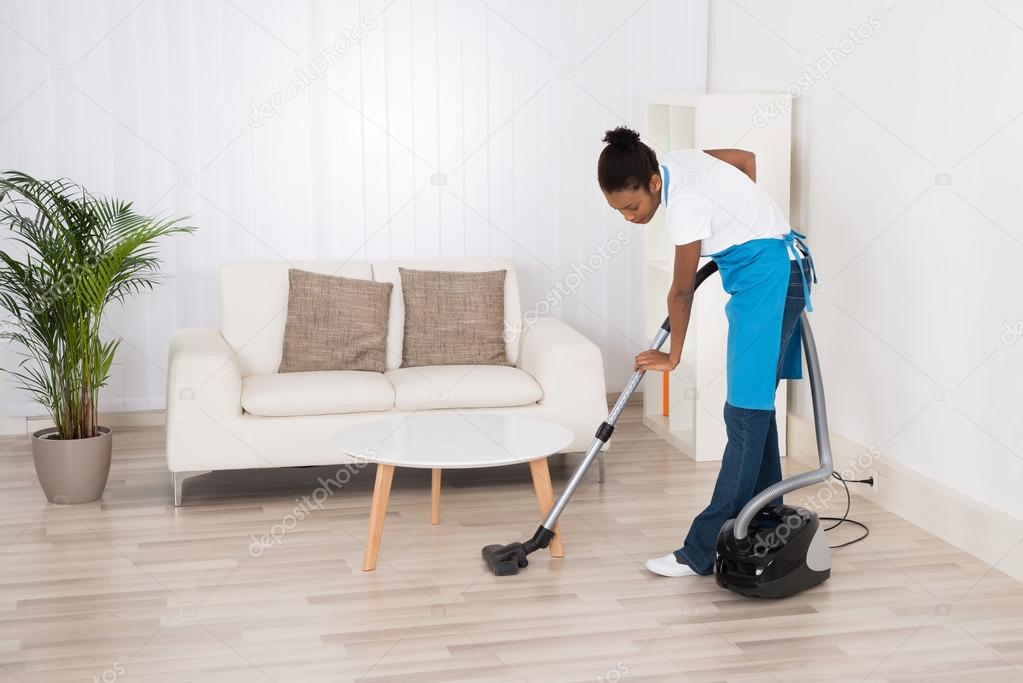 Female Janitor Cleaning Floor — Stock Photo © AndreyPopov #109796194