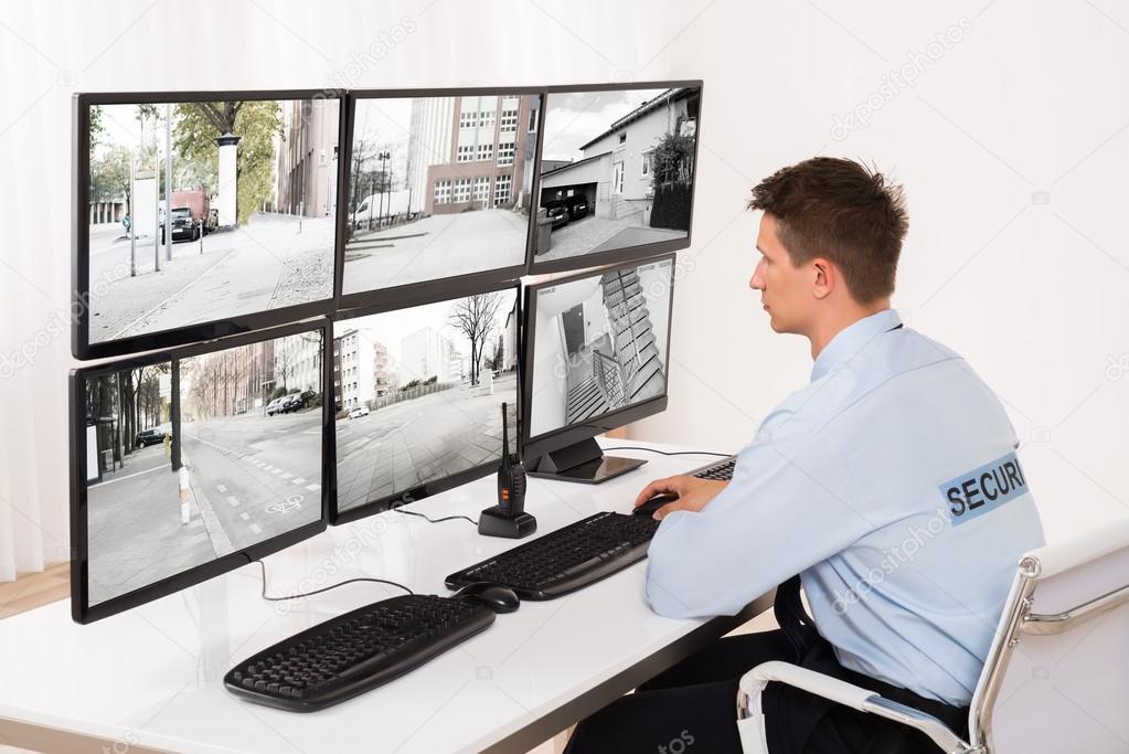 Security Guard Monitoring Multiple CCTV Footage Stock Photo by ...