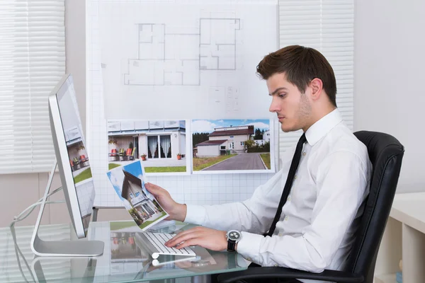 Real Estate Agent Working On Computer - Stock Image - Everypixel