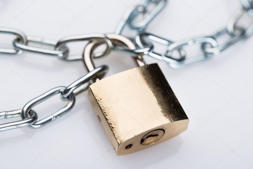 Metallic Padlock And Chains Stock Photo by ©AndreyPopov 58793467