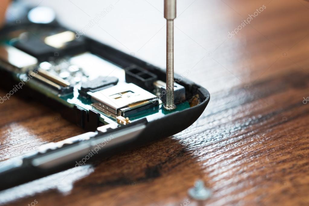 Process Of Mobile Repair — Stock Photo © AndreyPopov #63335603