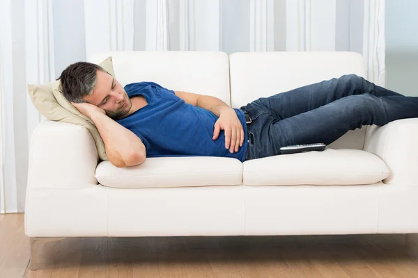 Man Sleeping On Couch - Stock Image - Everypixel
