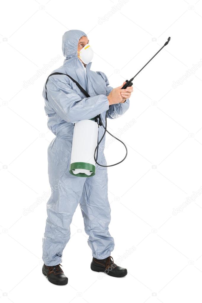 Pest Control Worker With Sprayer — Stock Photo © AndreyPopov #64647499