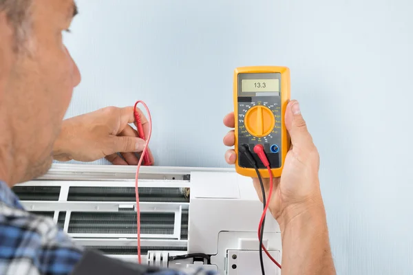 Technician Testing Air Conditioner - Stock Image - Everypixel