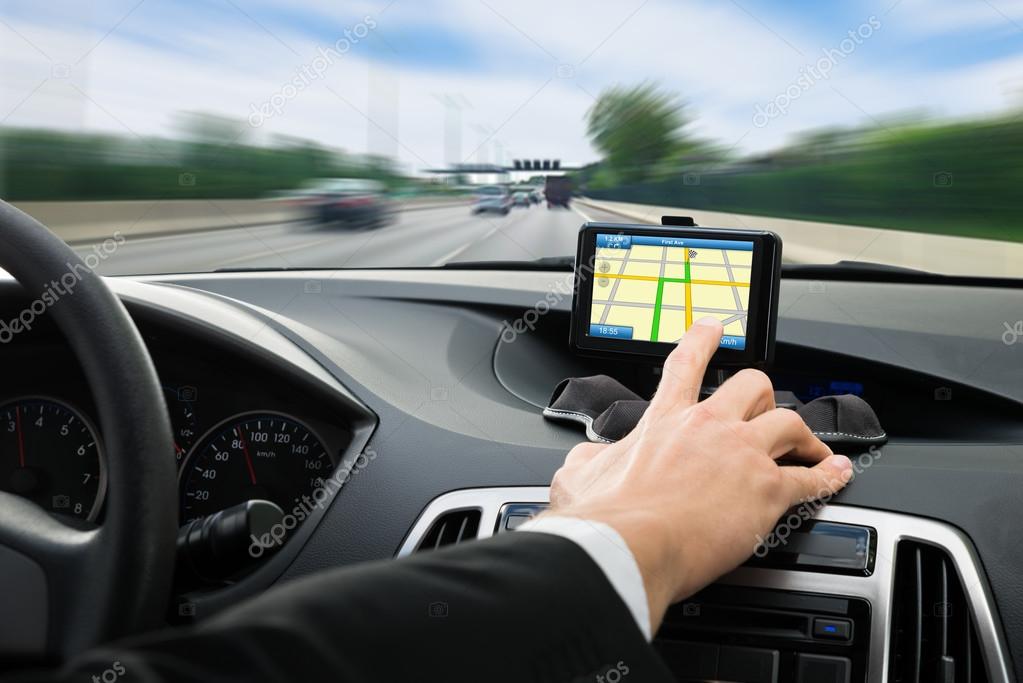 Person Hand Using Gps Navigation — Stock Photo © AndreyPopov #74130769 Person Hand Using Gps Navigation — Stock Photo © AndreyPopov #74130769