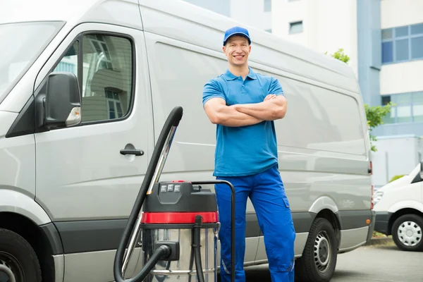 Cleaner Standing With Vacuum Cleaner - Stock Image - Everypixel
