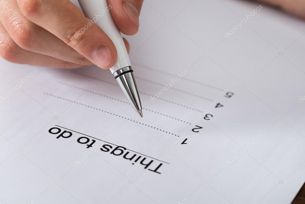 Hand Planning List Of Work — Stock Photo © AndreyPopov #80378158