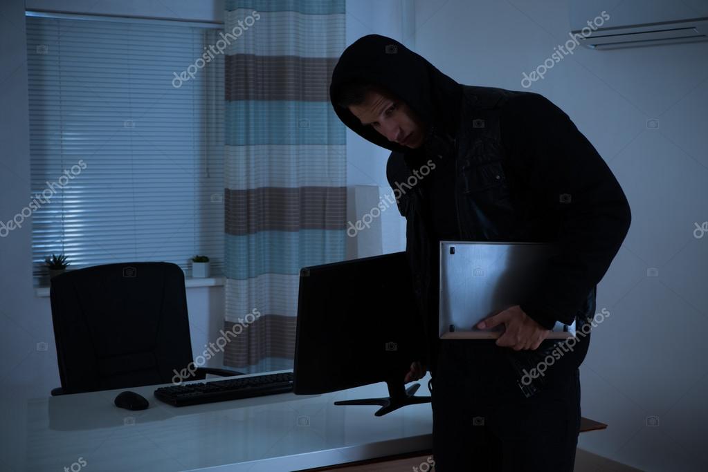 Thief Stealing Computer And Laptop — Stock Photo © AndreyPopov #84927776 Thief Stealing Computer And Laptop — Stock Photo © AndreyPopov #84927776