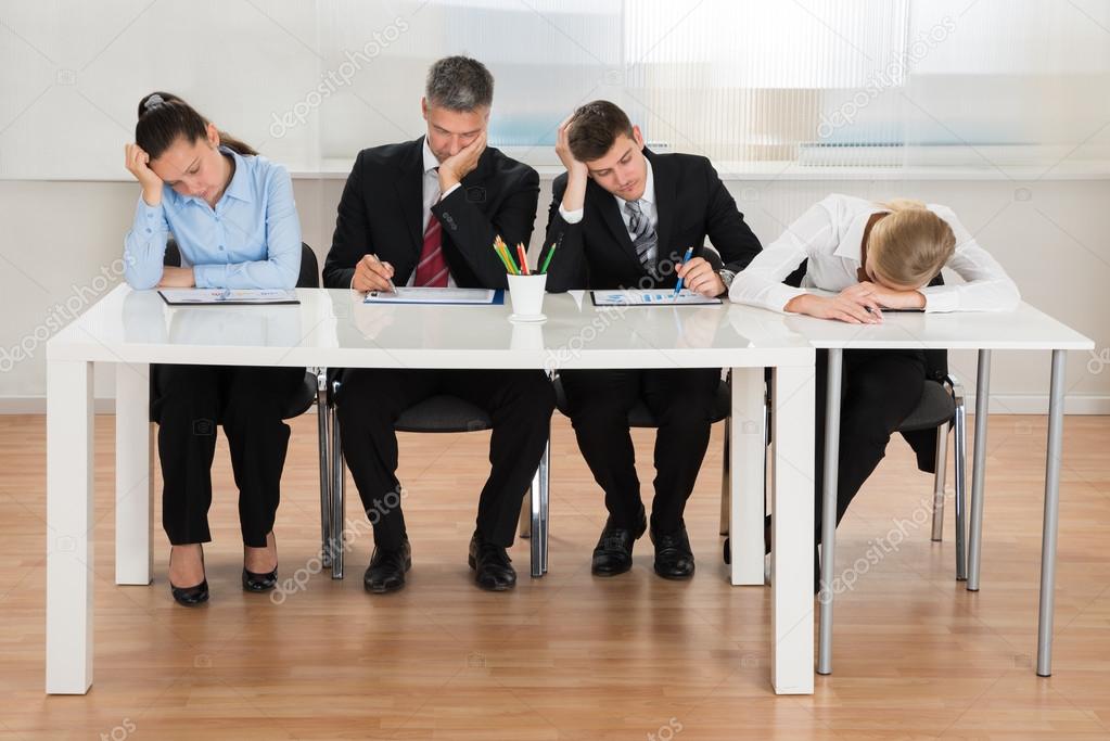 Businesspeople Getting Bored While Working In Office — Stock Photo ... Businesspeople Getting Bored While Working In Office — Stock Photo ...