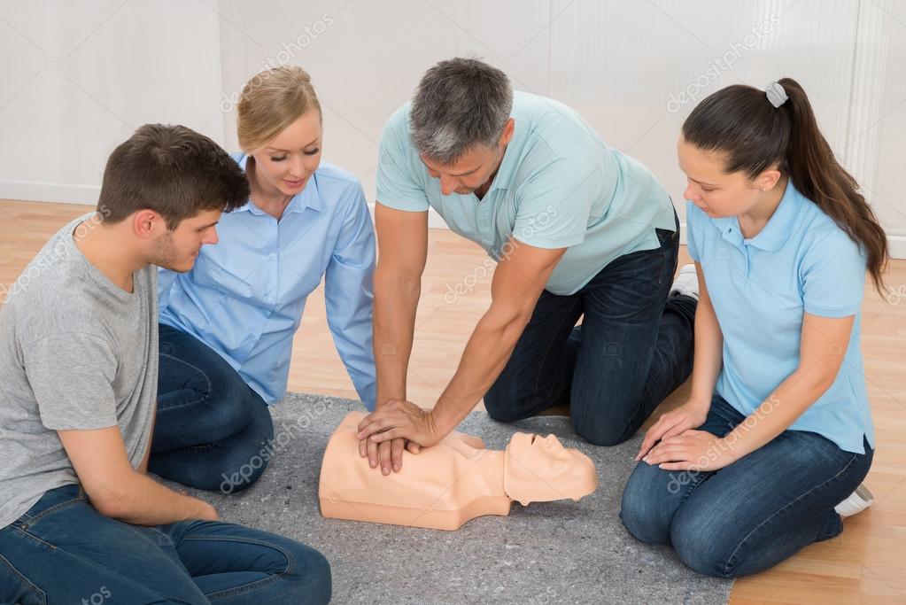 Instructor Showing Cpr Training On Dummy — Stock Photo © AndreyPopov ...
