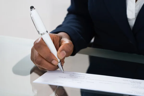 Giving Cheque To Other Person Stock Photo by ©AndreyPopov 89552176