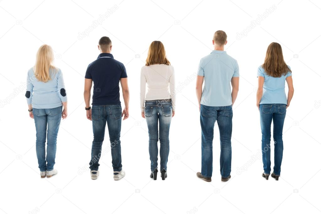 Rear View Of People Standing In Row Stock Photo by ©AndreyPopov 91701616
