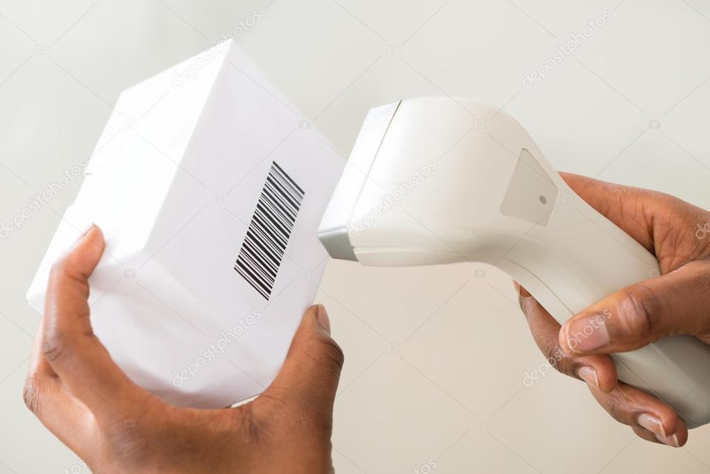 Using Barcode Scanner To Scan A Barcode — Stock Photo © AndreyPopov ...