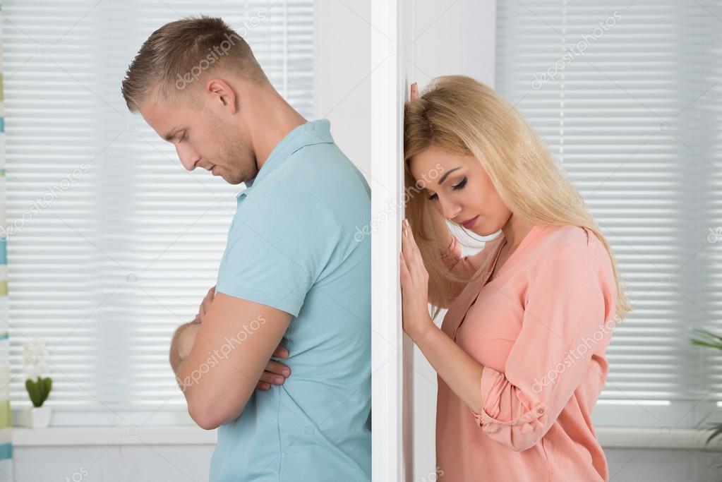 Couple Ignoring Each Other At Home — Stock Photo © AndreyPopov #97128048