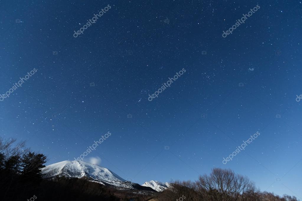 Star cluster with snow mountain Stock Photo by ©leungchopan 101377792