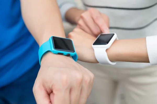 Group of people using smartwatch together Stock Photo by ©leungchopan ...