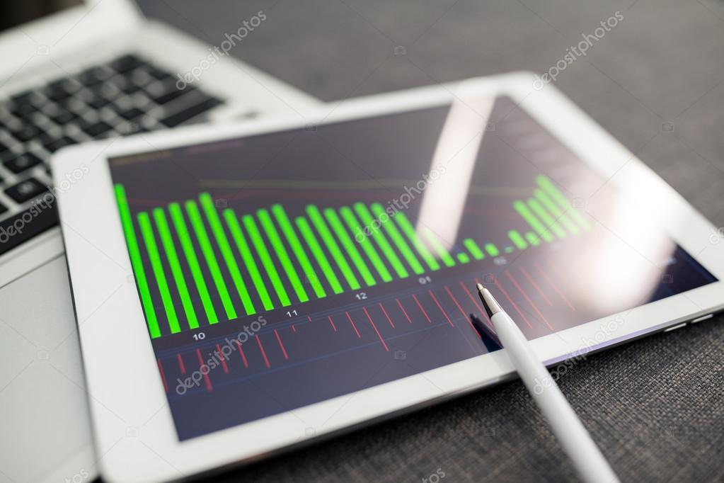 Digital tablet with business charts on a screen — Stock Photo ... Digital tablet with business charts on a screen — Stock Photo ...