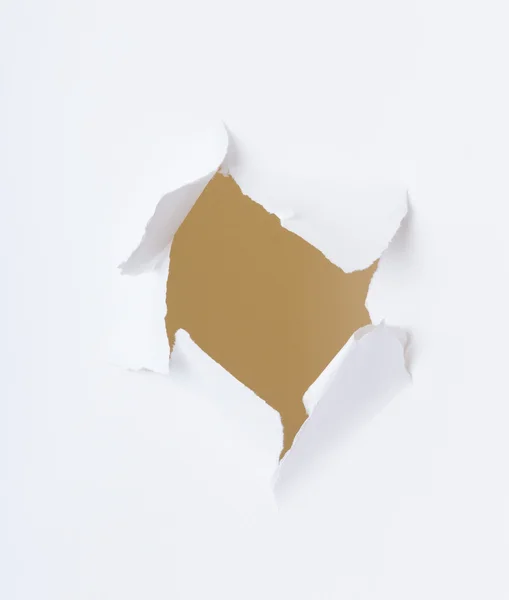 Hole in paper sheet Stock Photo by ©Rangizzz 9591700