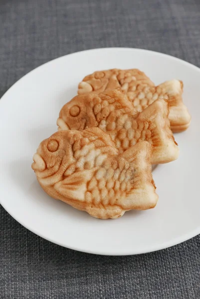 Traditional fish shape cake Stock Photo by ©leungchopan 69814615