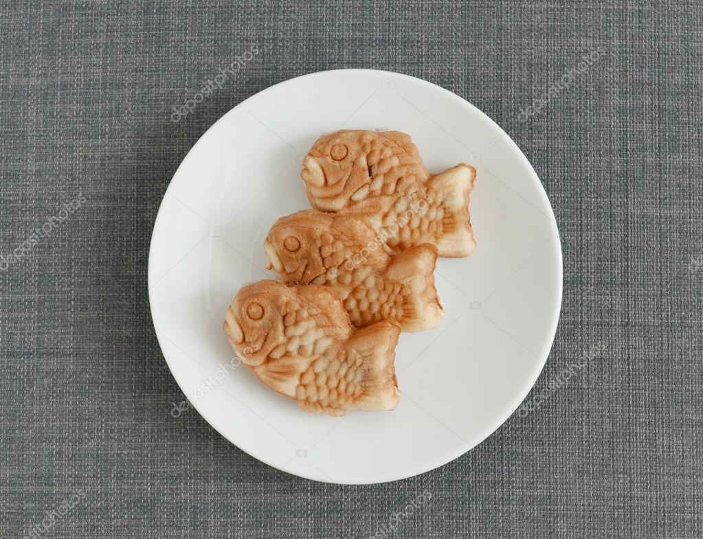 Traditional fish shape cake Stock Photo by ©leungchopan 69814615