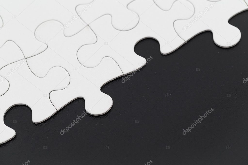 Plain white jigsaw puzzle Stock Photo by ©leungchopan 74145637