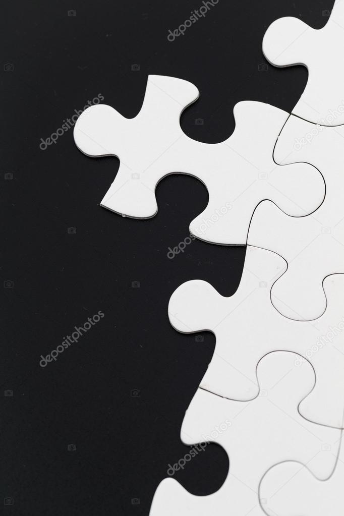 Plain white jigsaw puzzle Stock Photo by ©leungchopan 74477705