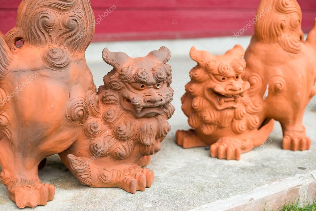 Japanese Lion sculptures ⬇ Stock Photo, Image by © leungchopan #96502428
