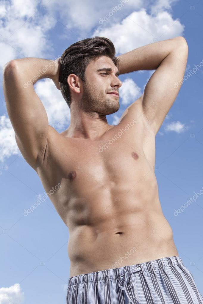 Man with hands behind head Stock Photo by ©londondeposit 57285913