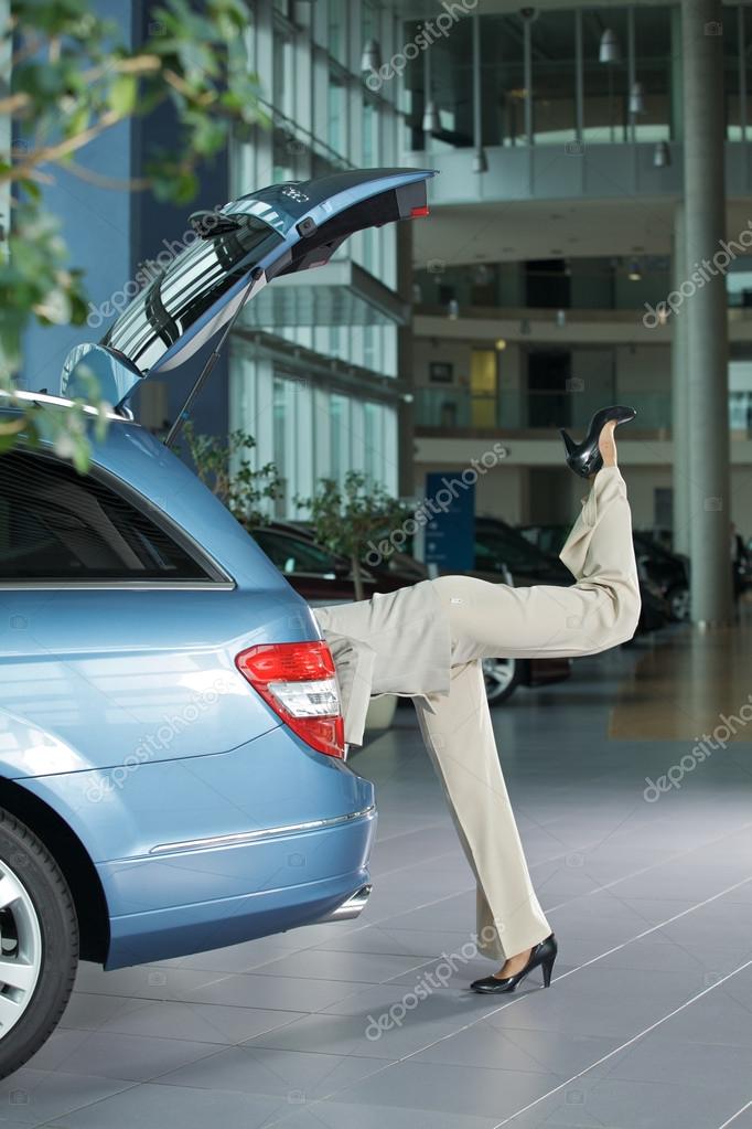 Customer examining car interior — Stock Photo © londondeposit #72091323 Customer examining car interior — Stock Photo © londondeposit #72091323