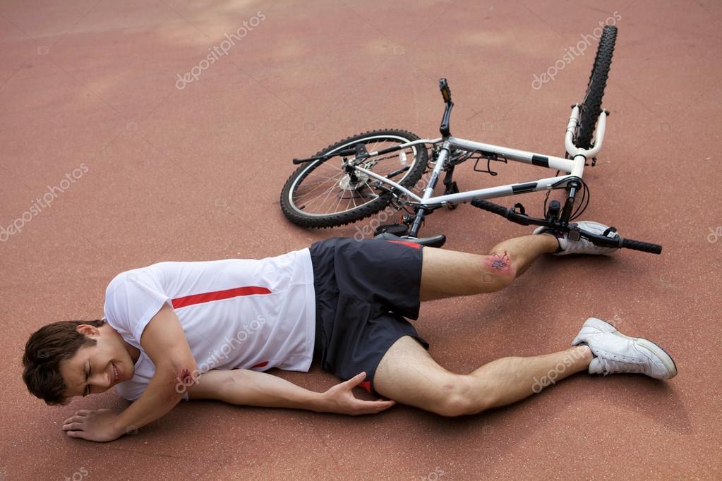 Man injured during riding a bike — Stock Photo © londondeposit #72092579