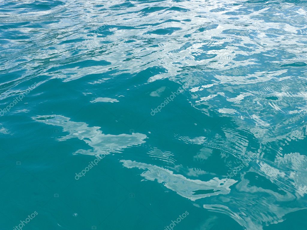 Shades of Turquoise Blue Ocean Water ripples off the Windward co ...