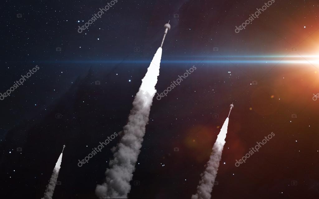 Three rockets in space. Elements of this image furnished by NASA Stock ...