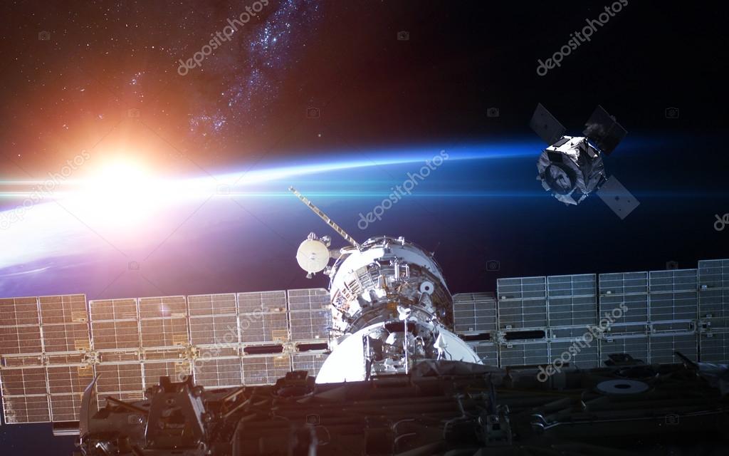 Spacecraft Launch Into Space. Elements of this image furnished by NASA ...