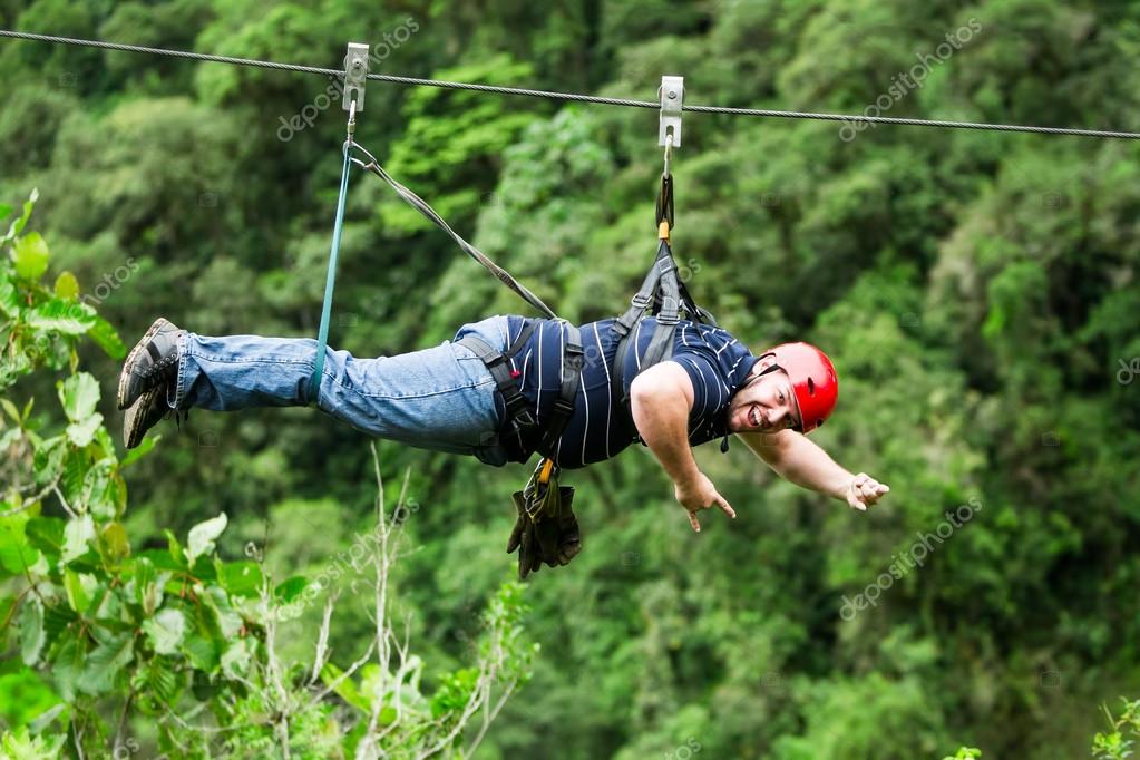 Oversized Tourist On Zip Line — Stock Photo © ammmit #87801952