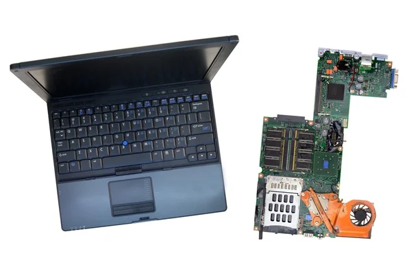 Laptop half disassembled. Laptop repair service Stock Photo by ...
