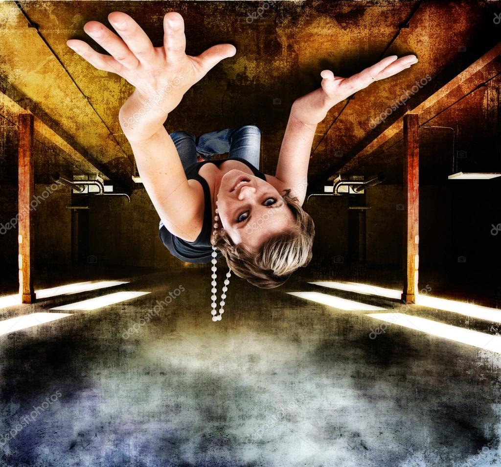 Girl crawling on the ceiling Stock Photo by ©graphicphoto 53480967